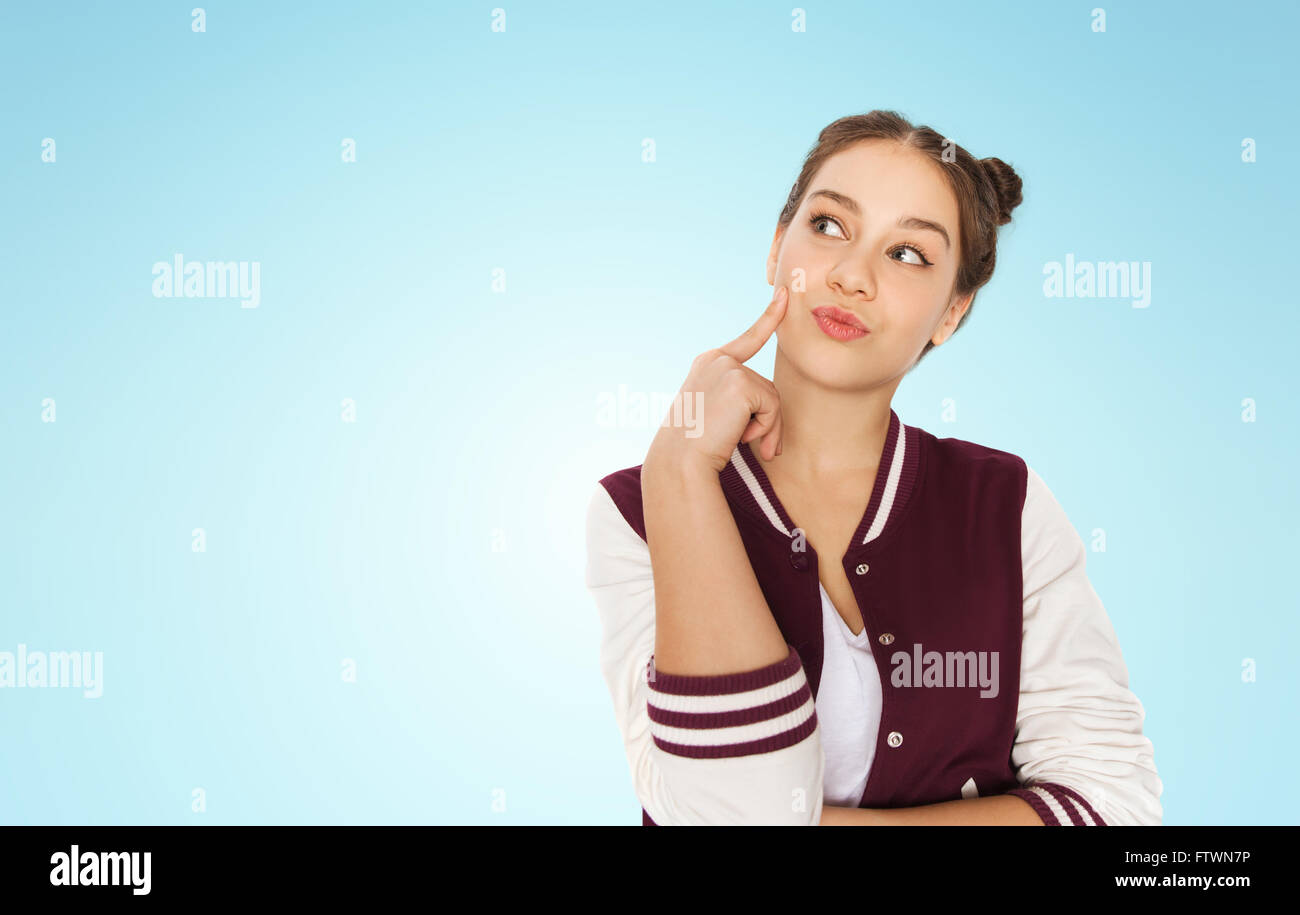 happy pretty teenage girl thinking Stock Photo - Alamy