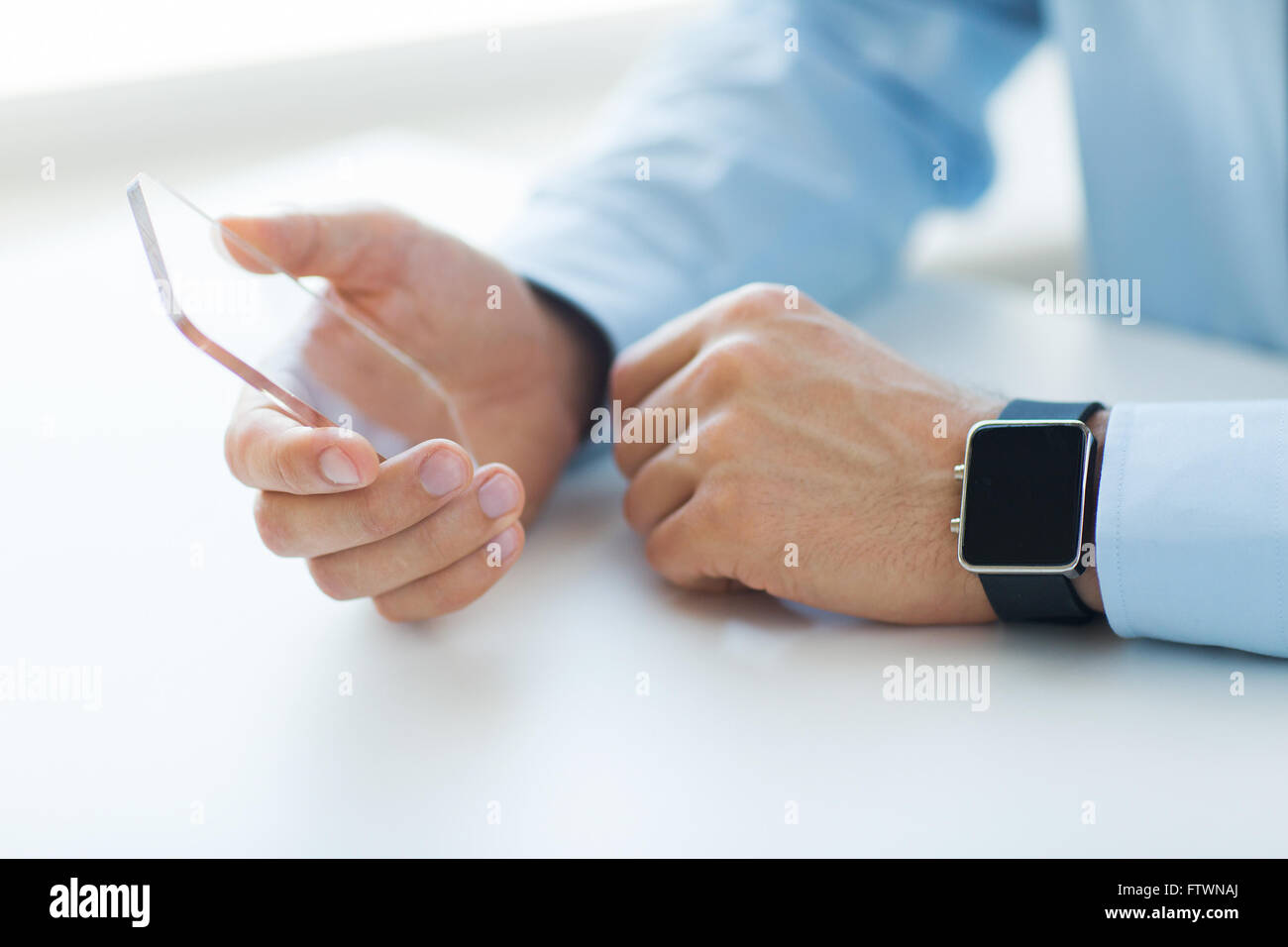 close up of hands with smart phone and watch Stock Photo - Alamy