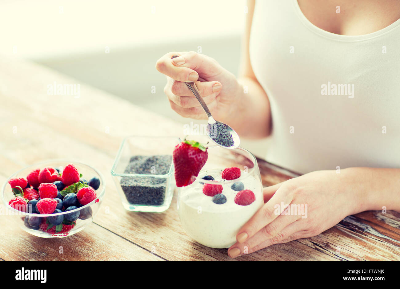 close up of woman hands with yogurt and berries Stock Photo - Alamy