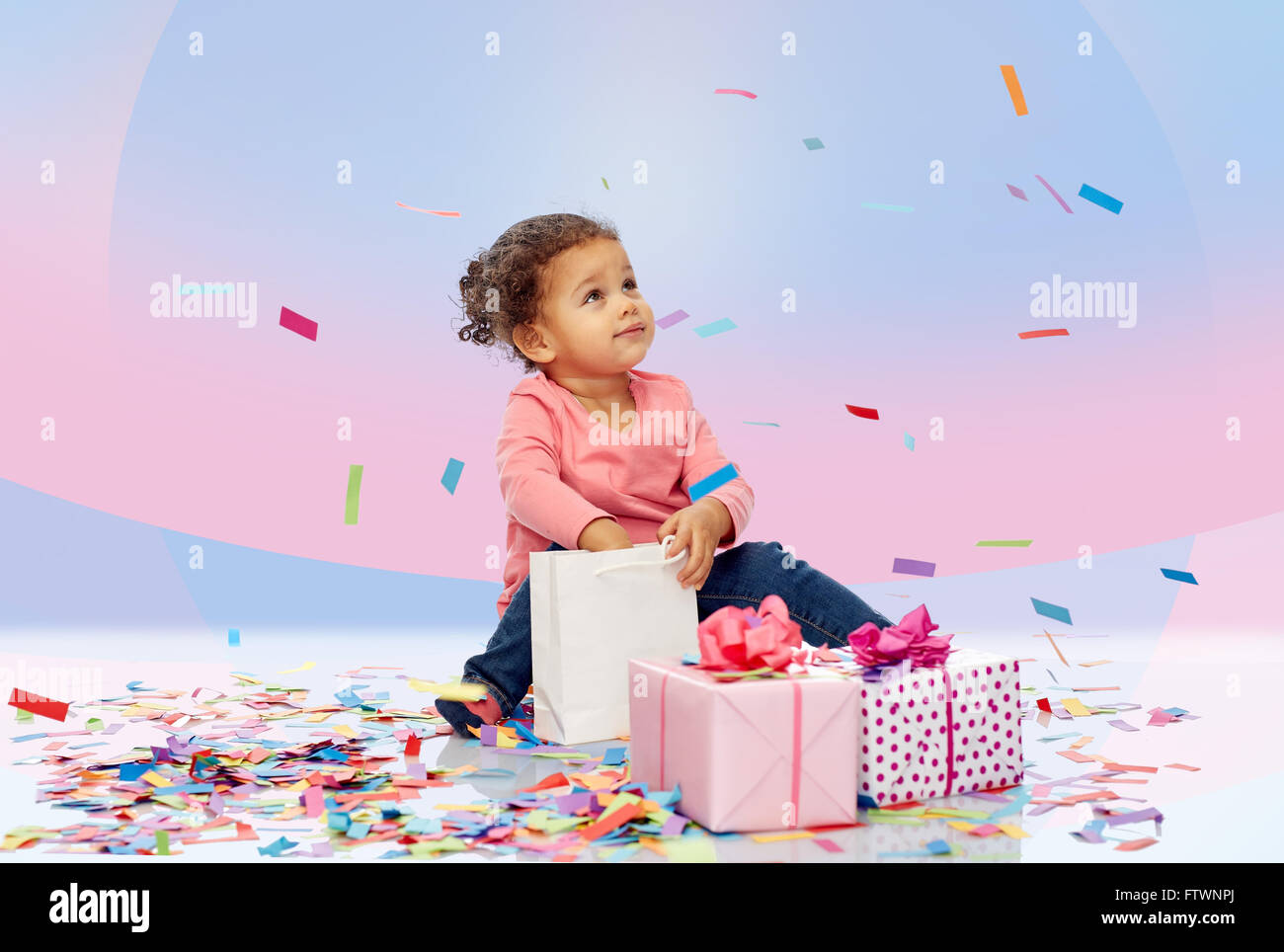 happy little baby girl with birthday presents Stock Photo - Alamy