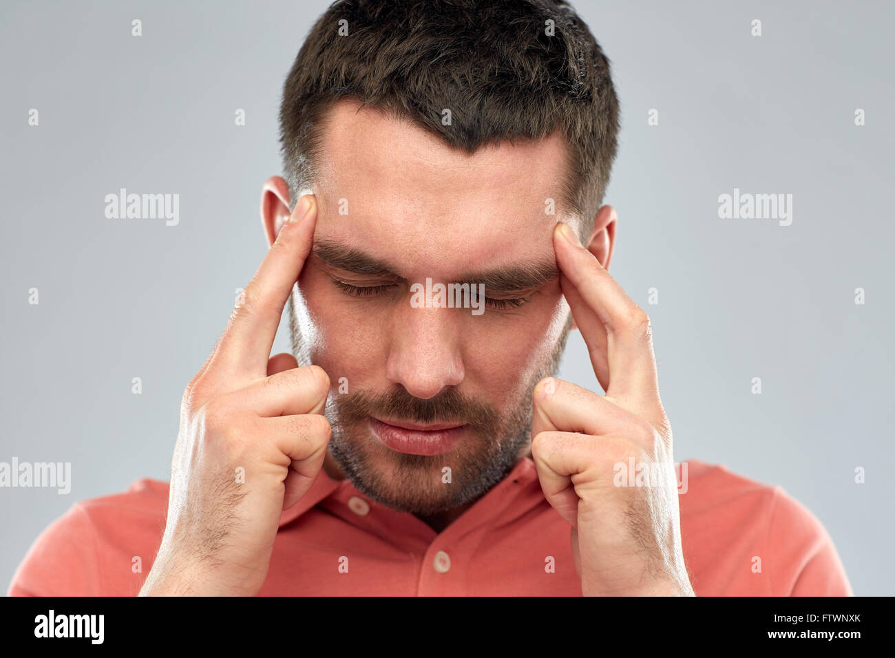 man suffering from head ache or thinking Stock Photo - Alamy