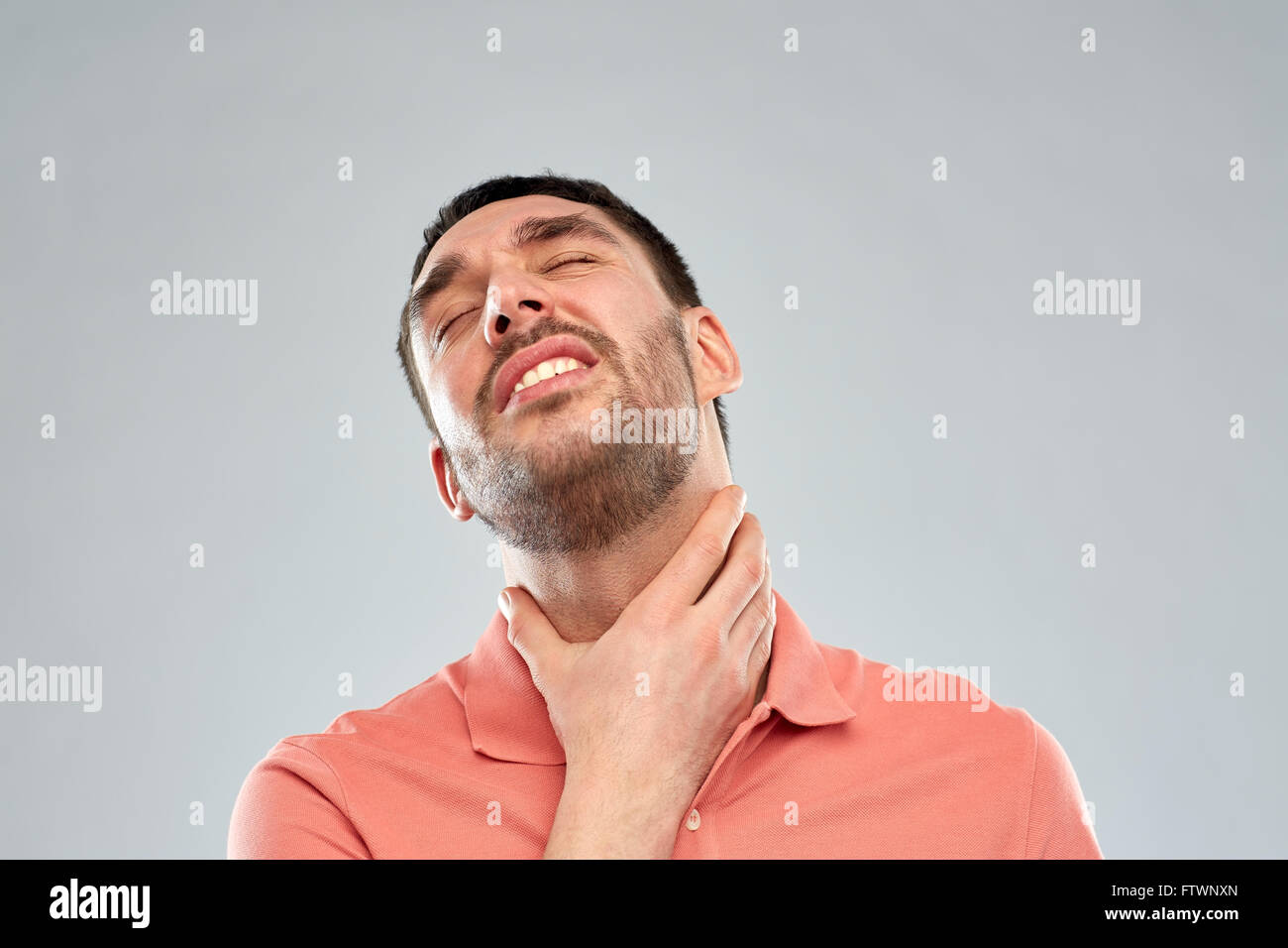 Person touching throat hi-res stock photography and images - Alamy
