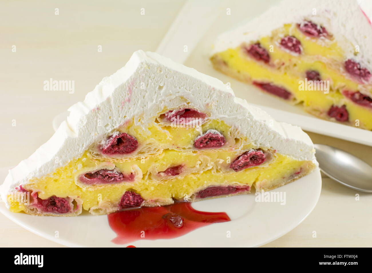 triangle cherry cake on white background Stock Photo - Alamy