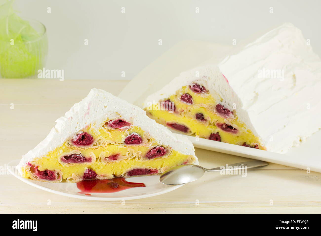triangle cherry cake on white background Stock Photo - Alamy