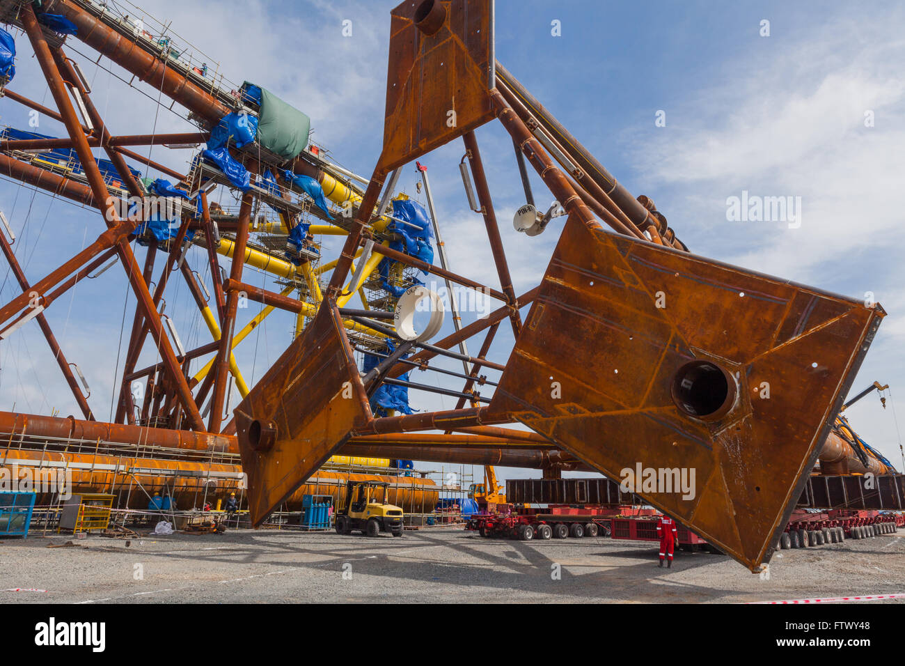 Oil rig jacket on trailer before moving to a barge Stock Photo - Alamy