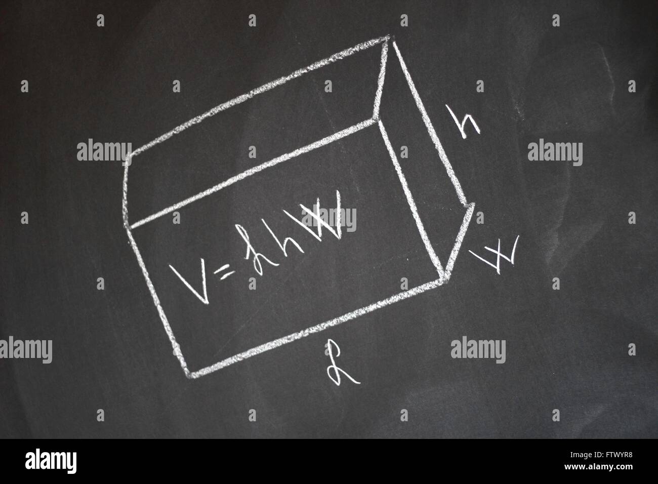 Studying mathematics on a blackboard Stock Photo - Alamy