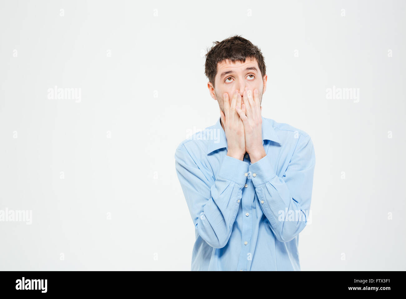 Disappointment man standing isolated on a white background Stock Photo ...