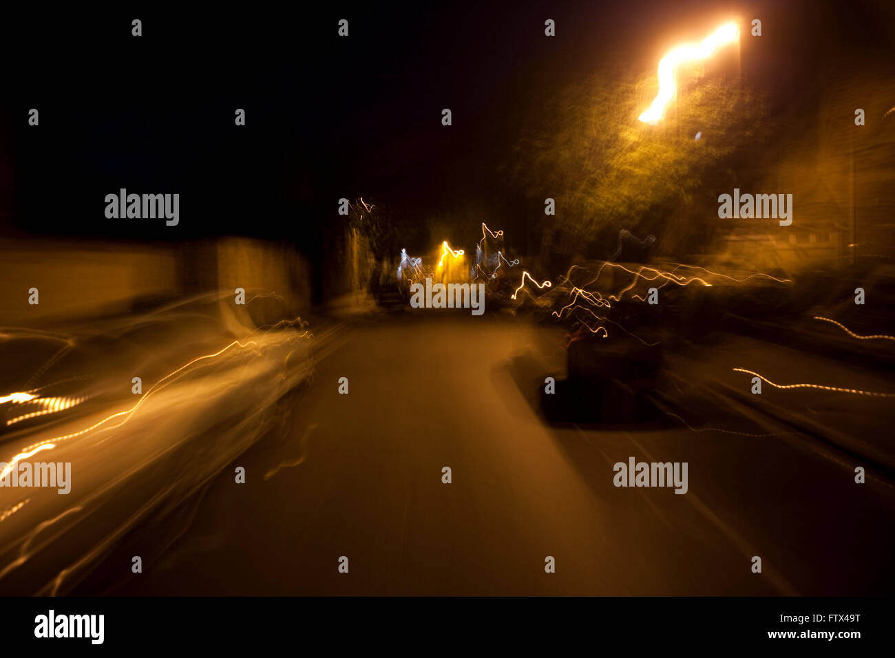 Abstract light patterns that imply movement or travel along roads and ...