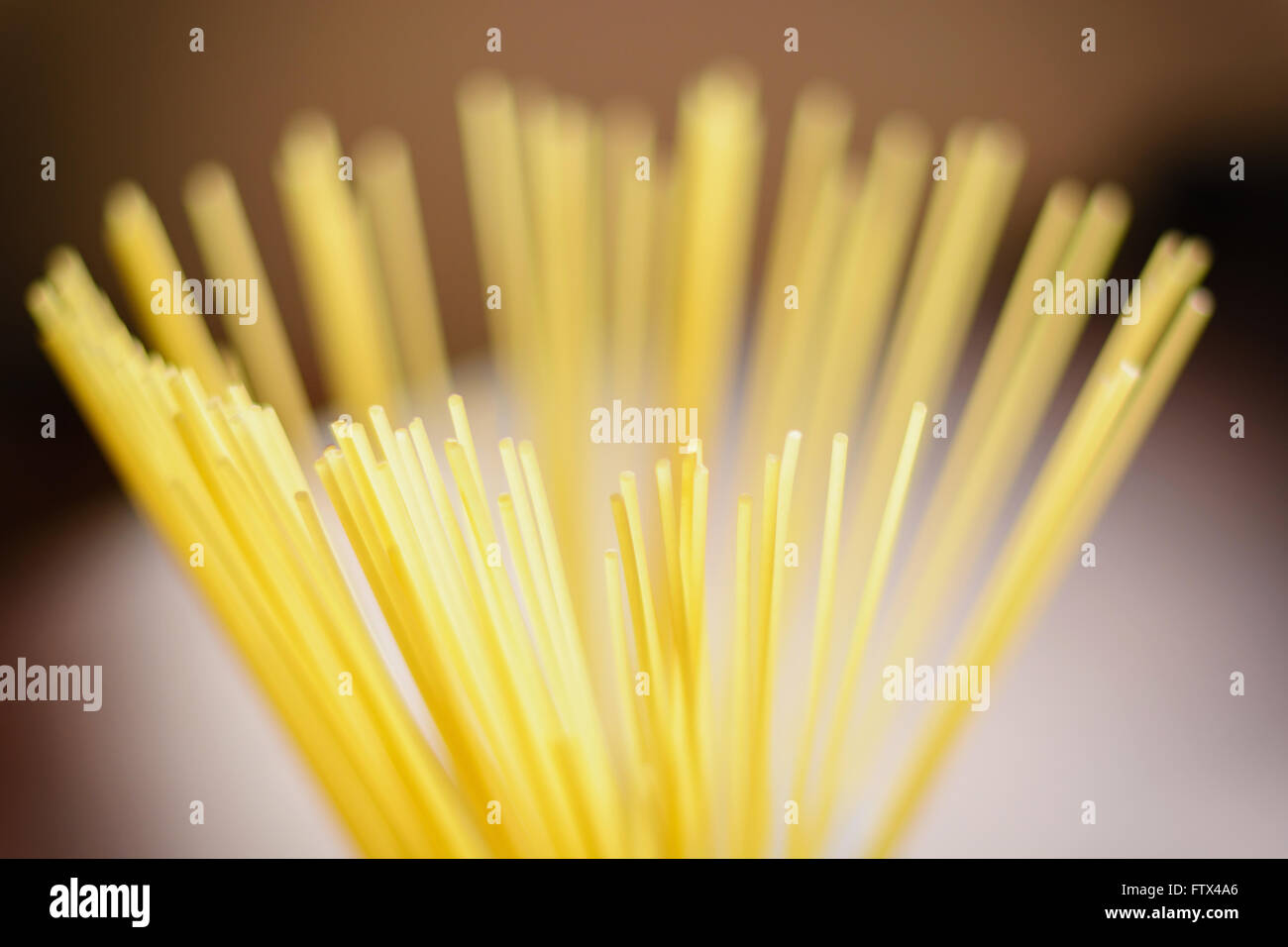 Long spaghetti in a transparent glass Stock Photo - Alamy
