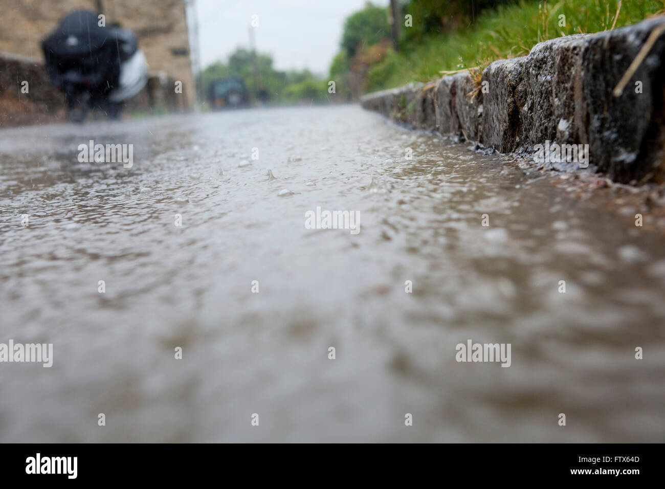 Water running down the gutter hi-res stock photography and images - Alamy