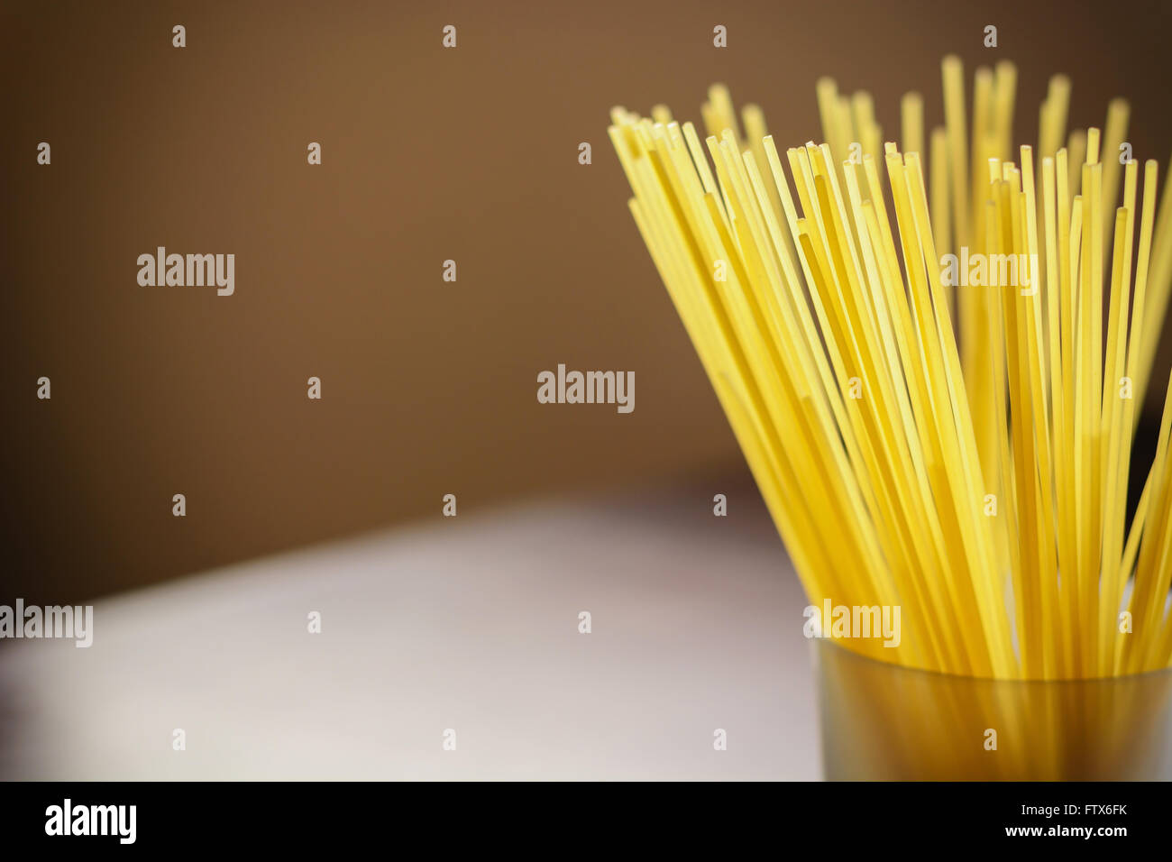 Uncooked long spaghetti dark hi-res stock photography and images - Alamy