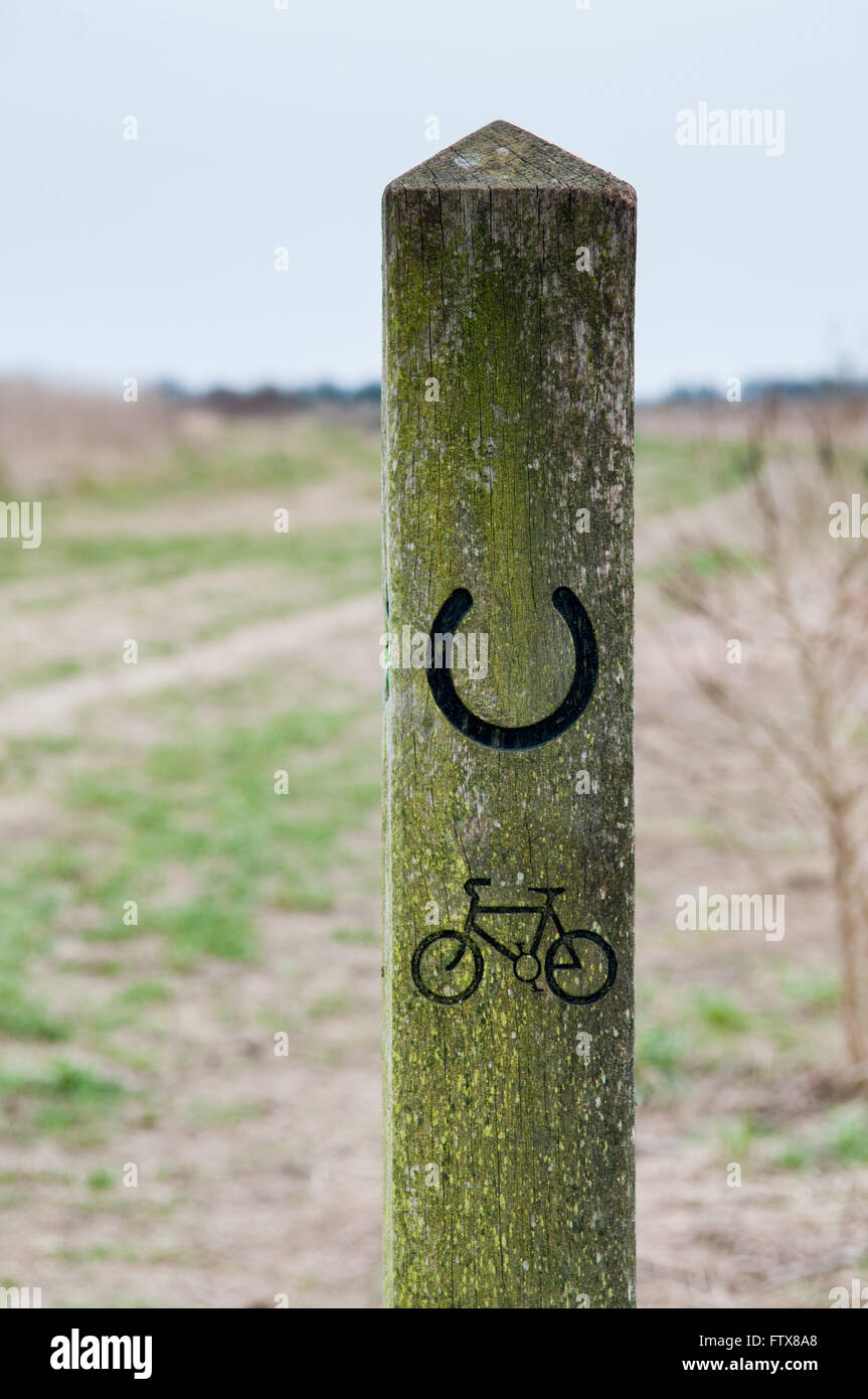Sign post showing the way for cyclists on a country path Stock Photo ...