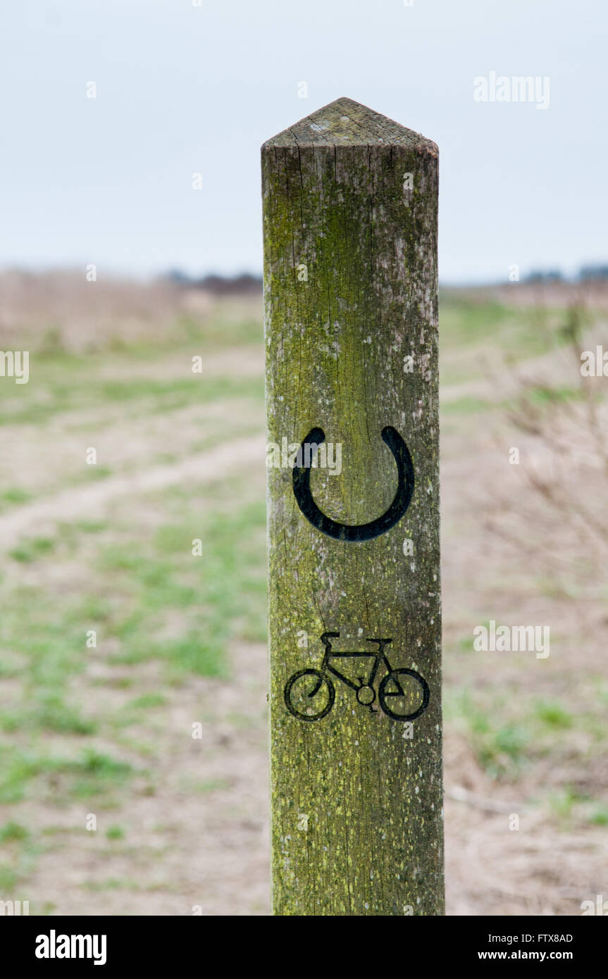 Sign post showing the way for cyclists on a country path Stock Photo ...