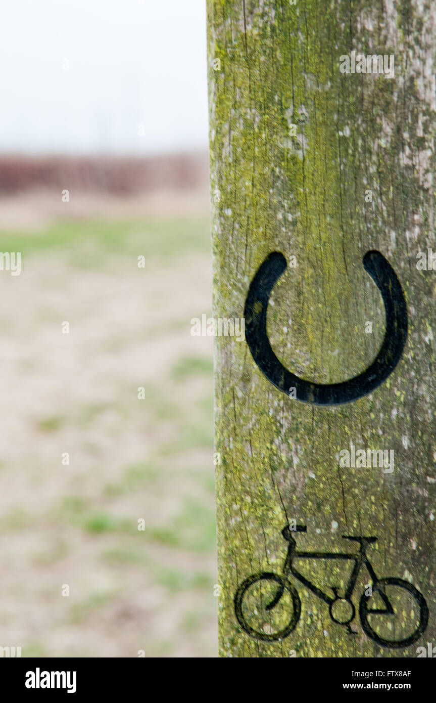 Sign post showing the way for cyclists on a country path Stock Photo ...
