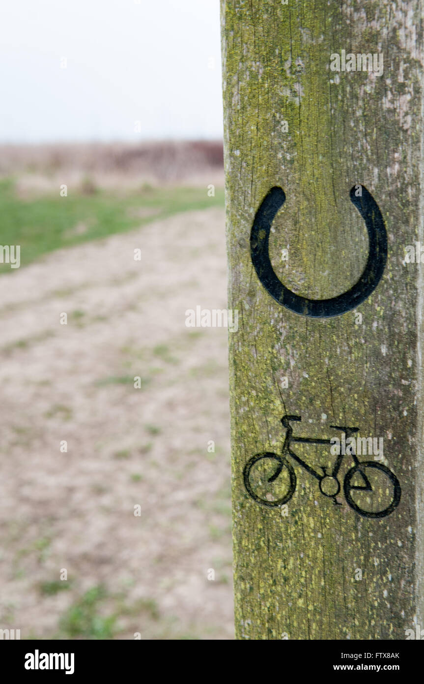 Sign post showing the way for cyclists on a country path Stock Photo ...
