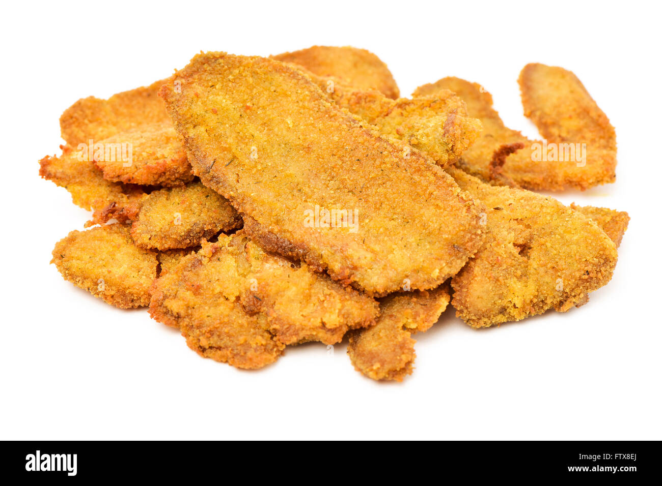 some cooked breaded fillets of seitan on a white background Stock Photo ...