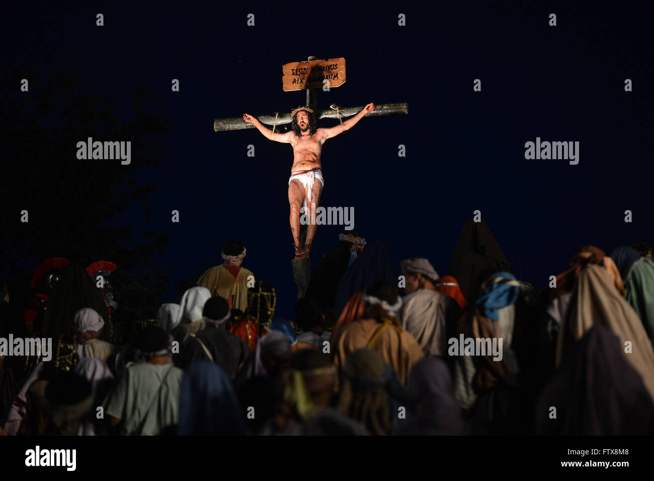Christ crucifixion re enact night hi-res stock photography and images ...