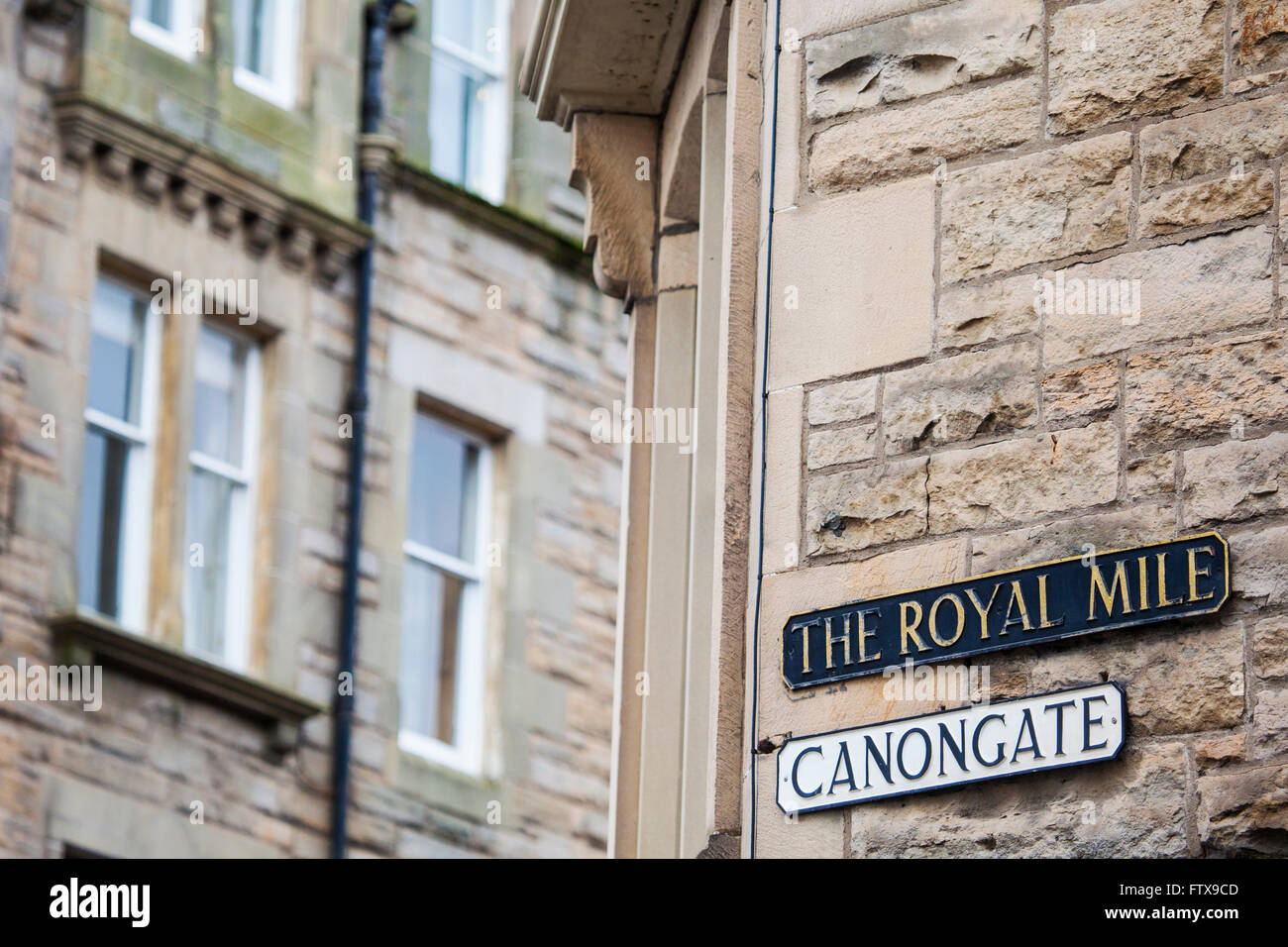The street signs for Canongate and The Royal Mile in the historic city ...