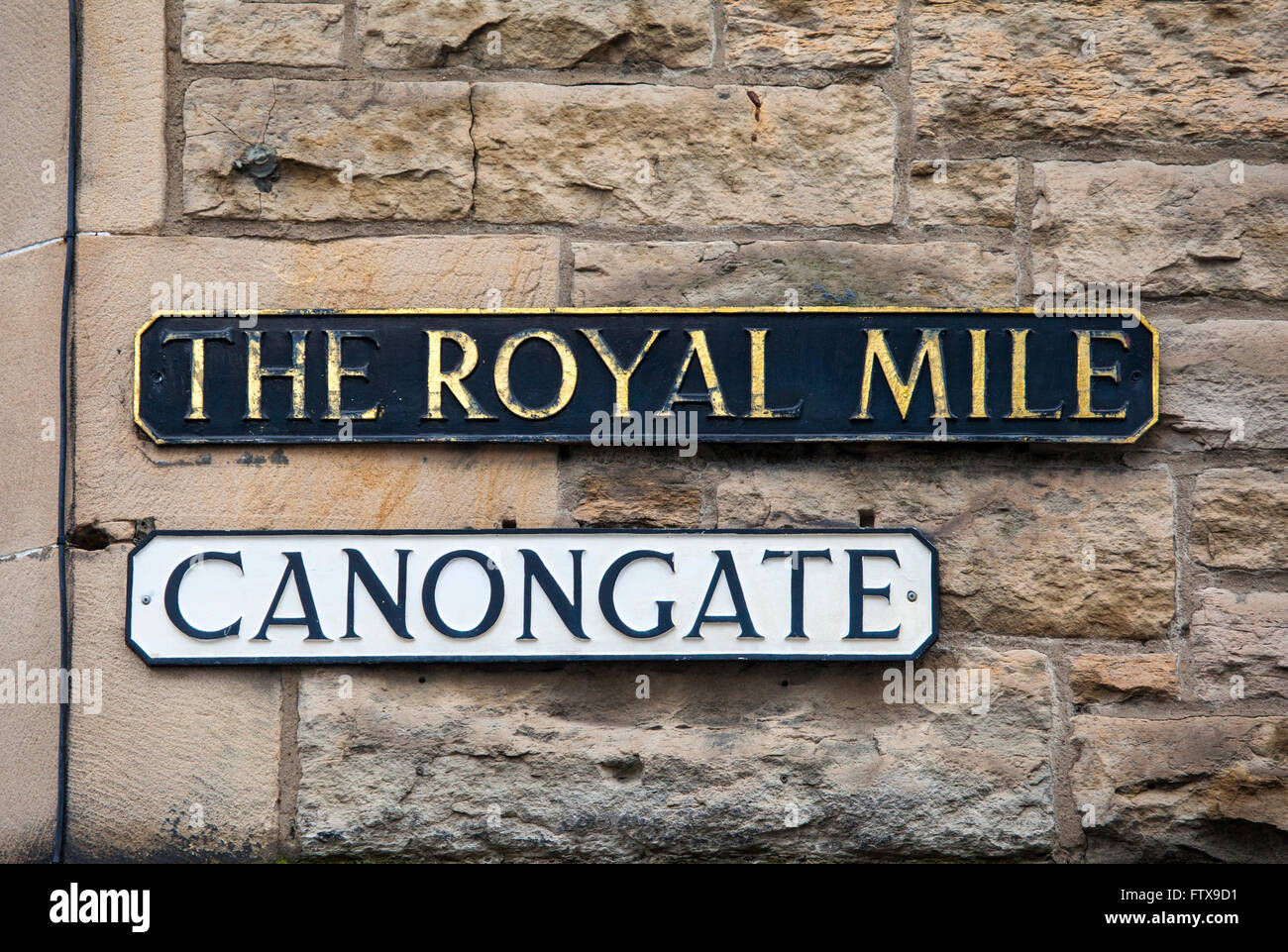 The street signs for Canongate and The Royal Mile in the historic city ...