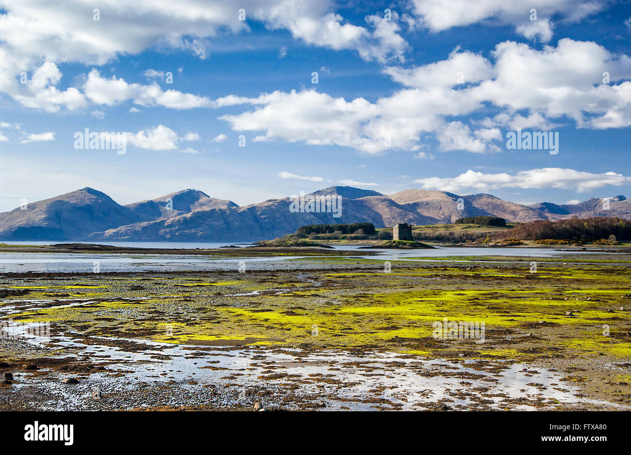 Castle Stalker is a four-story tower house or keep picturesquely set on ...