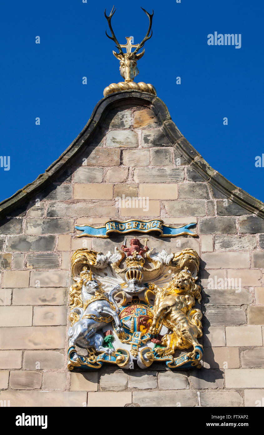 A detailed view of the coat of arms on the exterior of Canongate Kirk ...