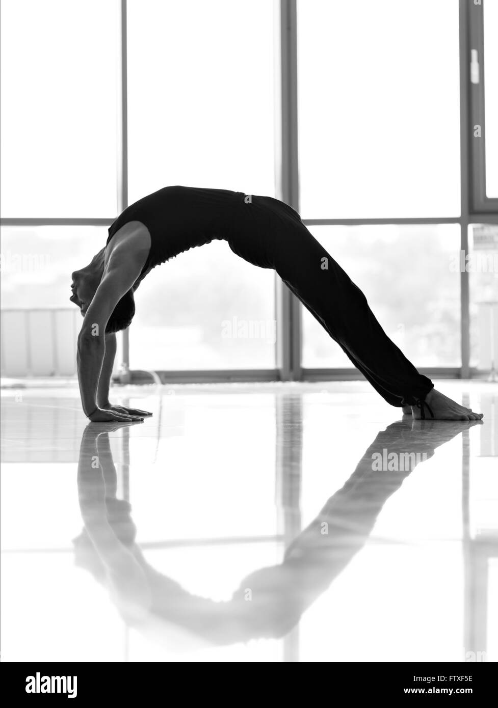 Man doing pilates Black and White Stock Photos & Images - Alamy