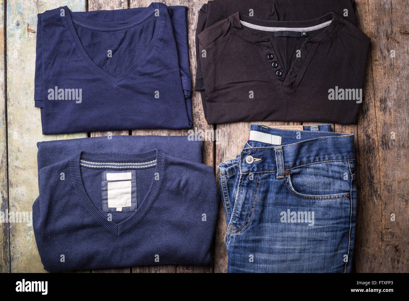 Various Man clothes collected on wooden background. Collection of men's ...