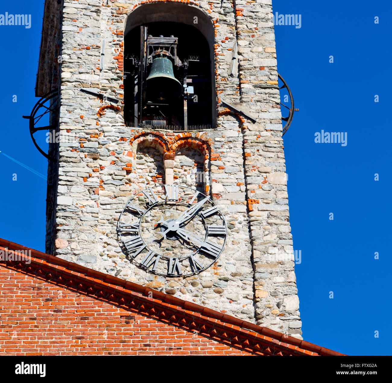 ancien clock tower in italy europe old stone antique and bell Stock ...