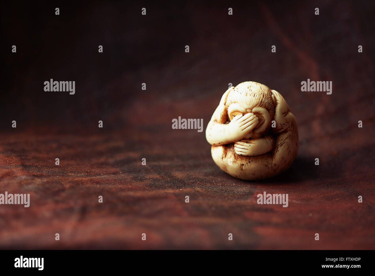 Three wise monkeys or Three Mystic Apes sacred ancient icon, brown ...