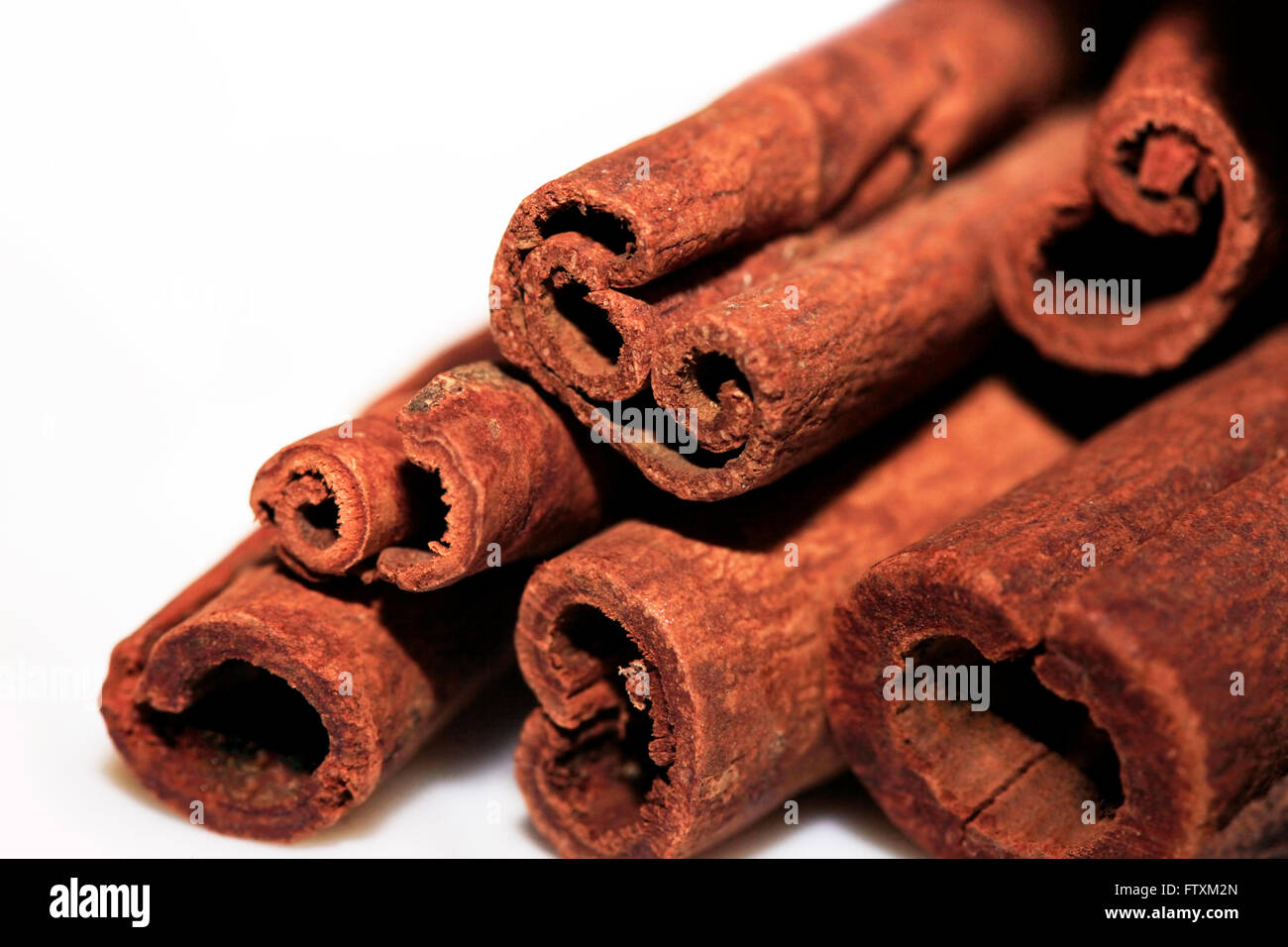 Cinnamon isolated on white background Stock Photo - Alamy