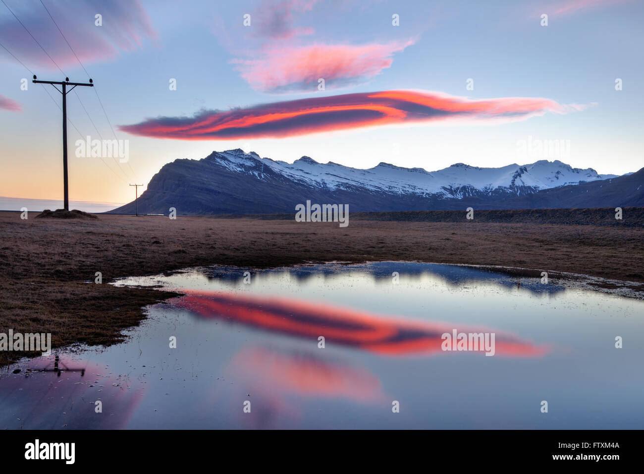 Lenticular cloud over mountains, Southern Iceland, Iceland Stock Photo ...
