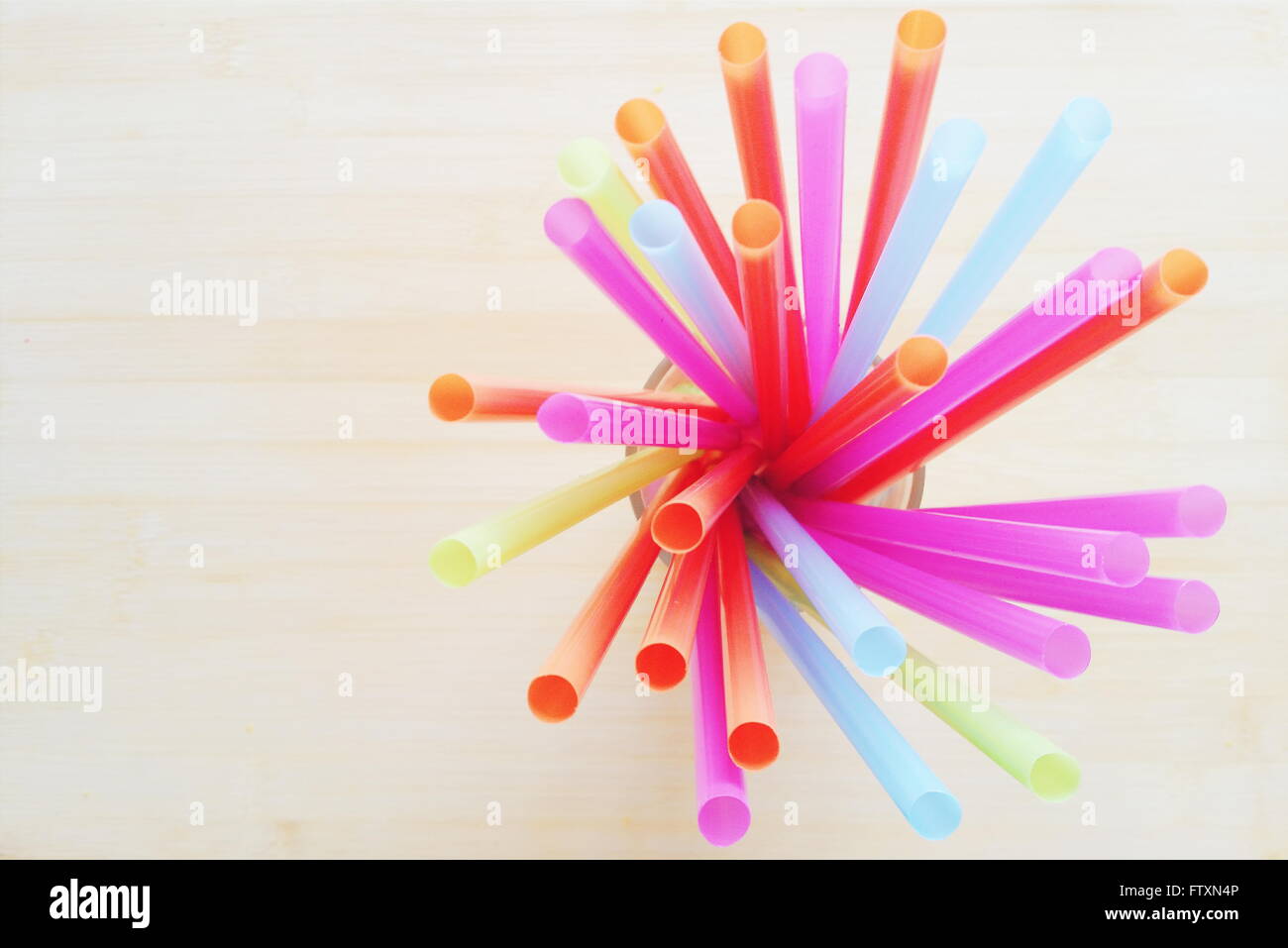 Multi-colored drinking straws in a glass Stock Photo - Alamy