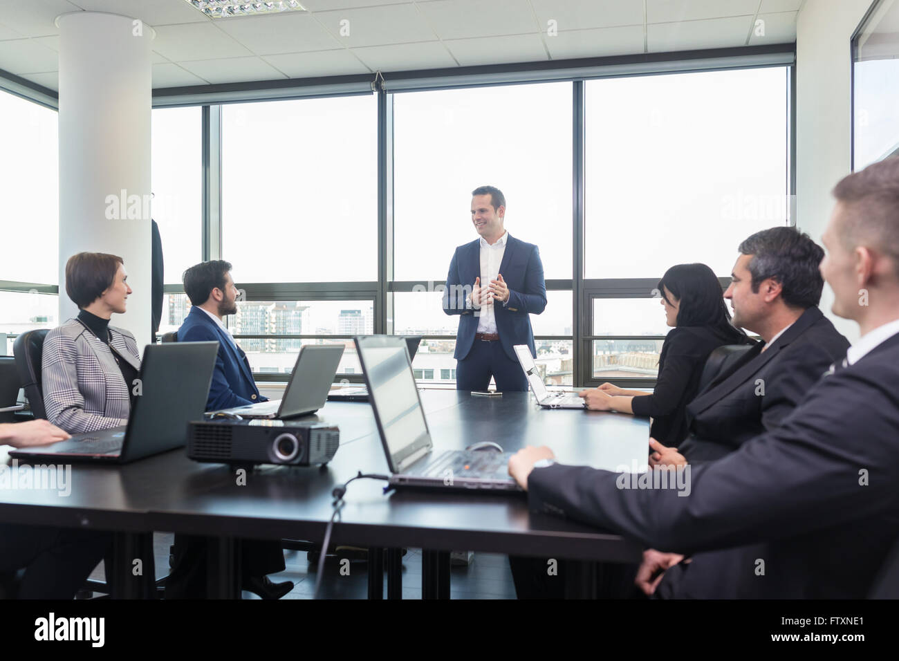 Corporate business team office meeting Stock Photo - Alamy