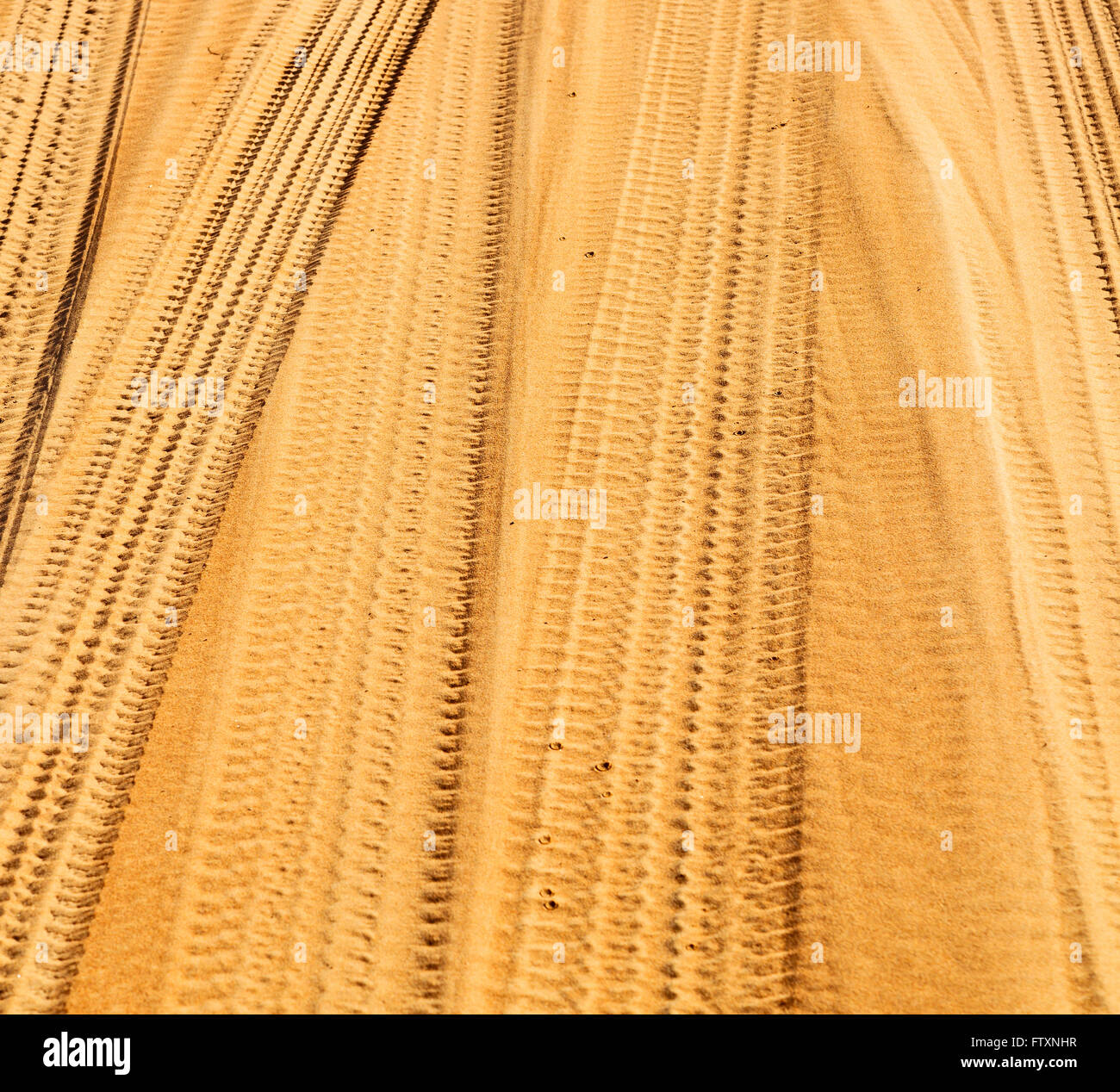 in the sand and direction texture oman desert track of some cars Stock ...
