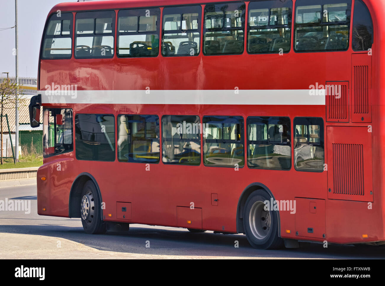 Closeup of a red double deck bus on the intersection Stock Photo - Alamy