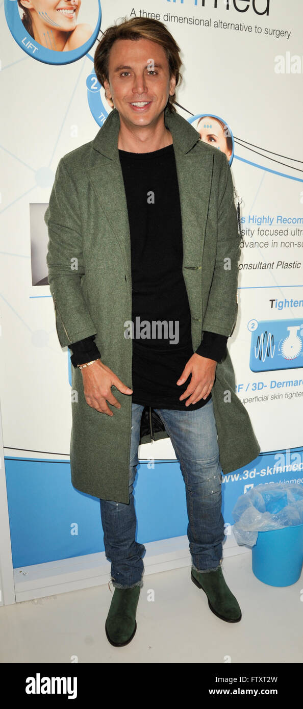 Jonathan Cheban helps out on the 3D Lipo stand at the Professional ...
