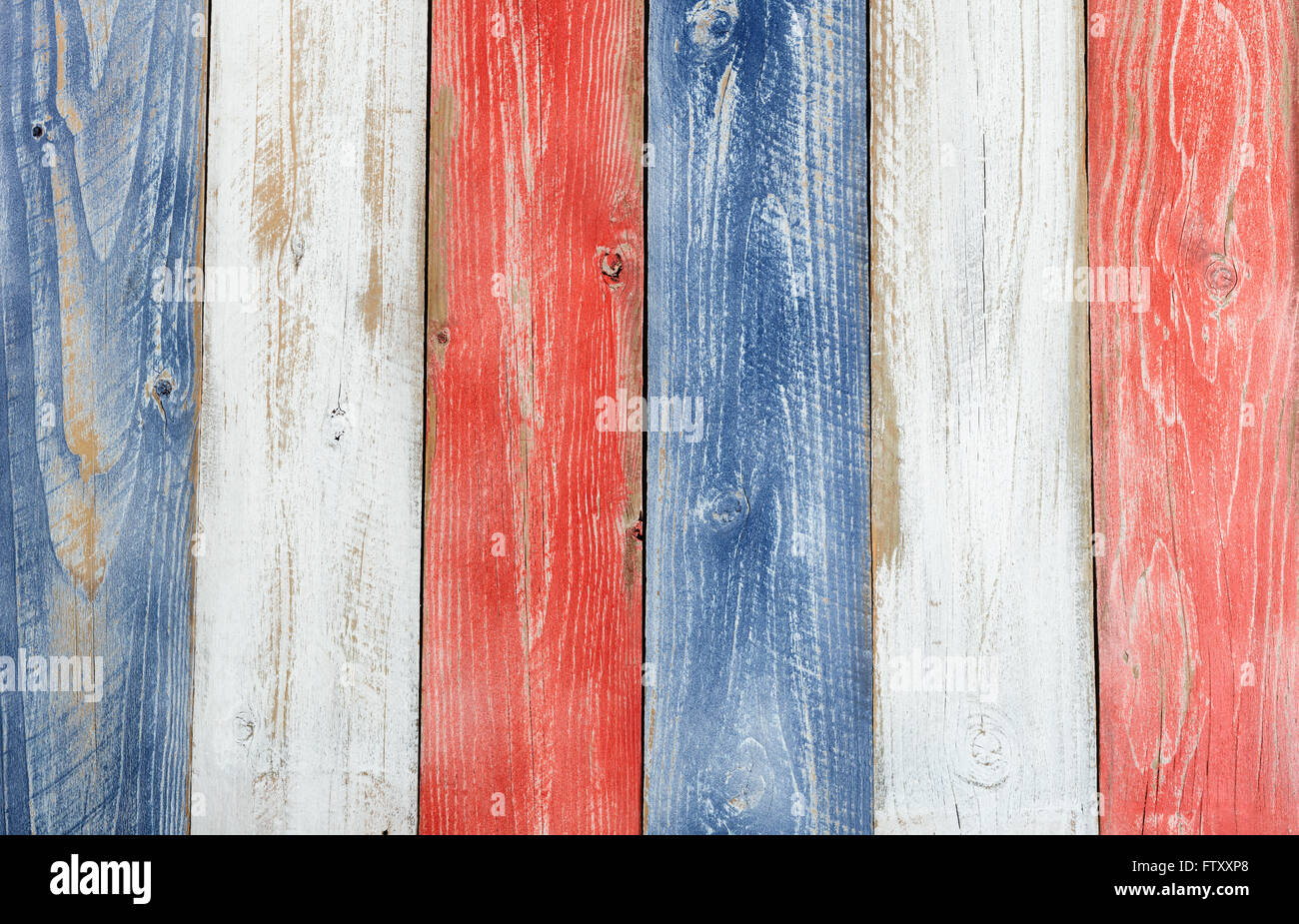 Stressed wooden boards painted red, white and blue for patriotic ...