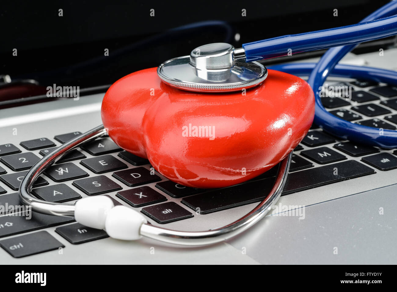 Cardiologist, heart disease research, stethoscope and heart shape on ...