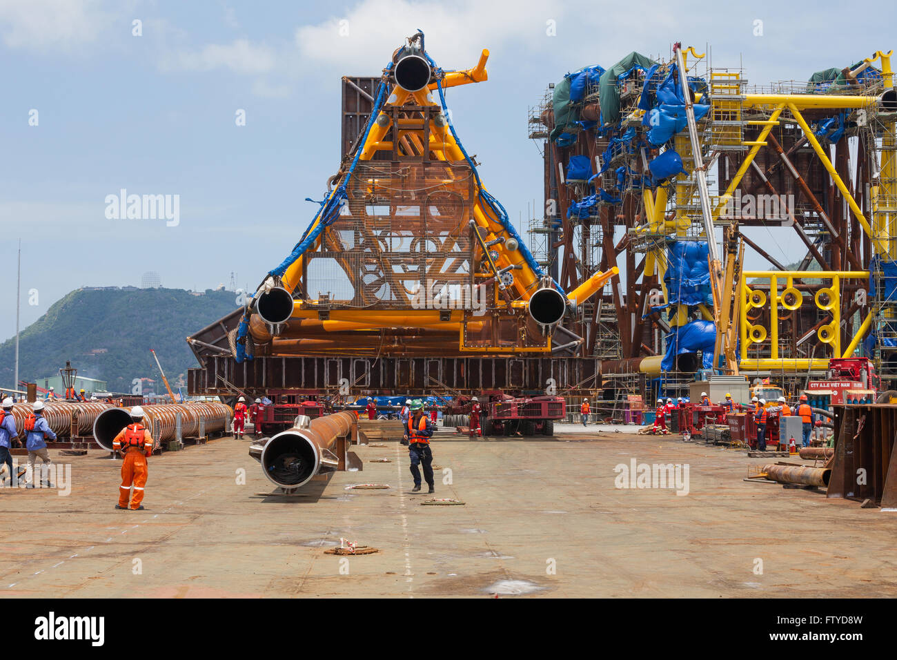 Oil platform being transfered to a barge before sailing Stock Photo - Alamy