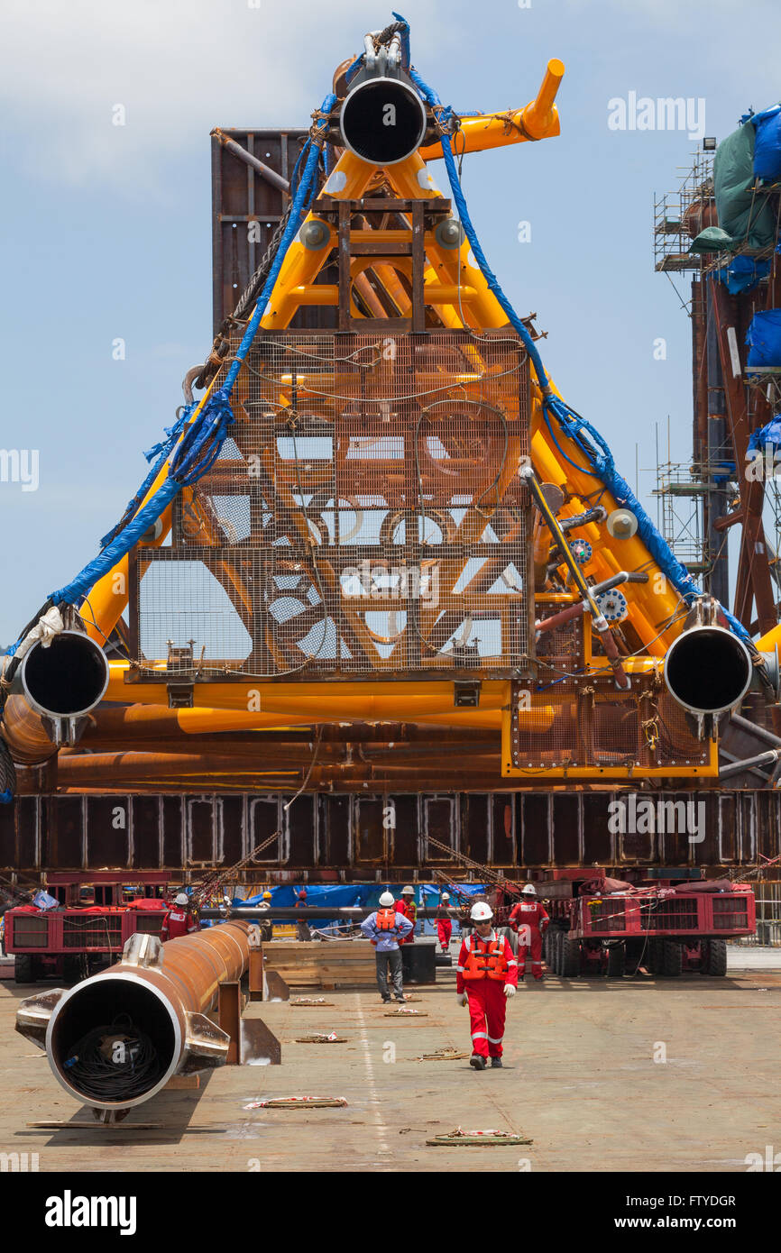 Oil platform being transfered to a barge before sailing Stock Photo - Alamy