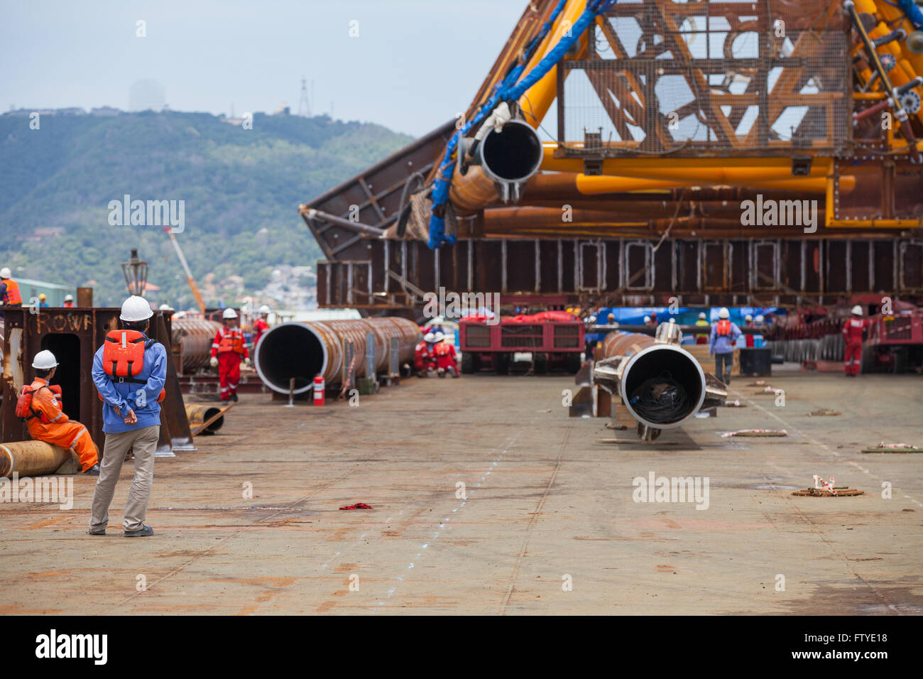 Oil platform being transfered to a barge before sailing Stock Photo - Alamy