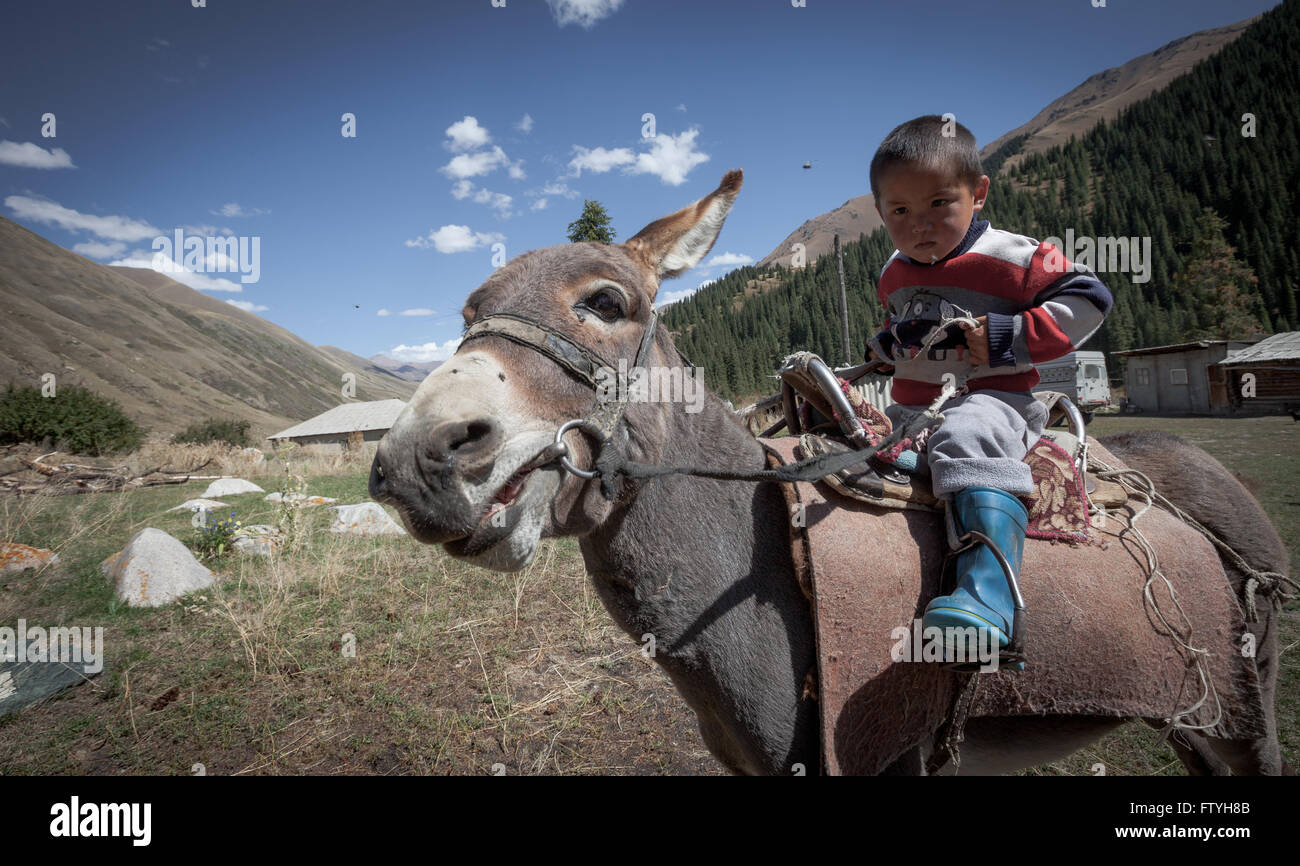Children riding a donkey hi-res stock photography and images - Alamy