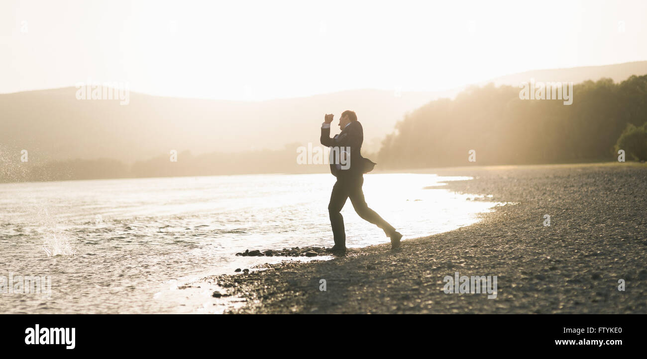 Throwing pebbles hi-res stock photography and images - Alamy
