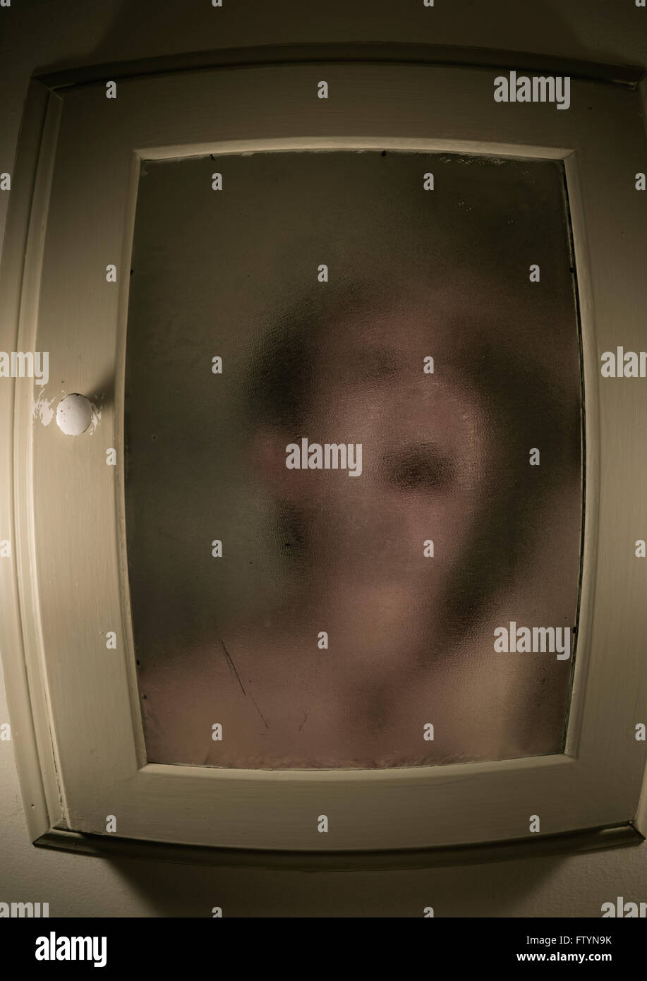 Mirror reflection of an anguished man Stock Photo - Alamy