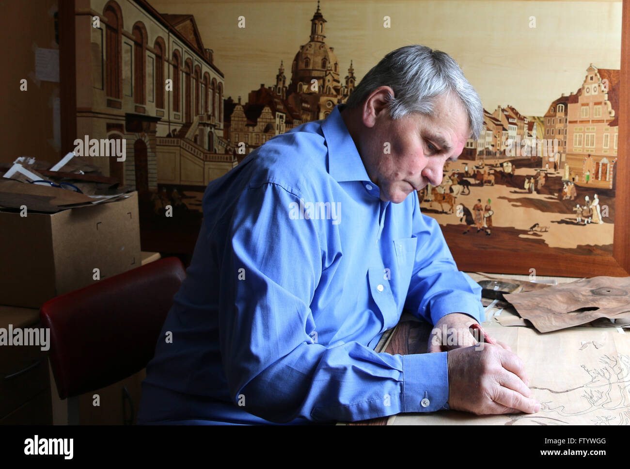 Thum, Germany. 04th Mar, 2016. Inlay cutter Harry Mueller works on his ...