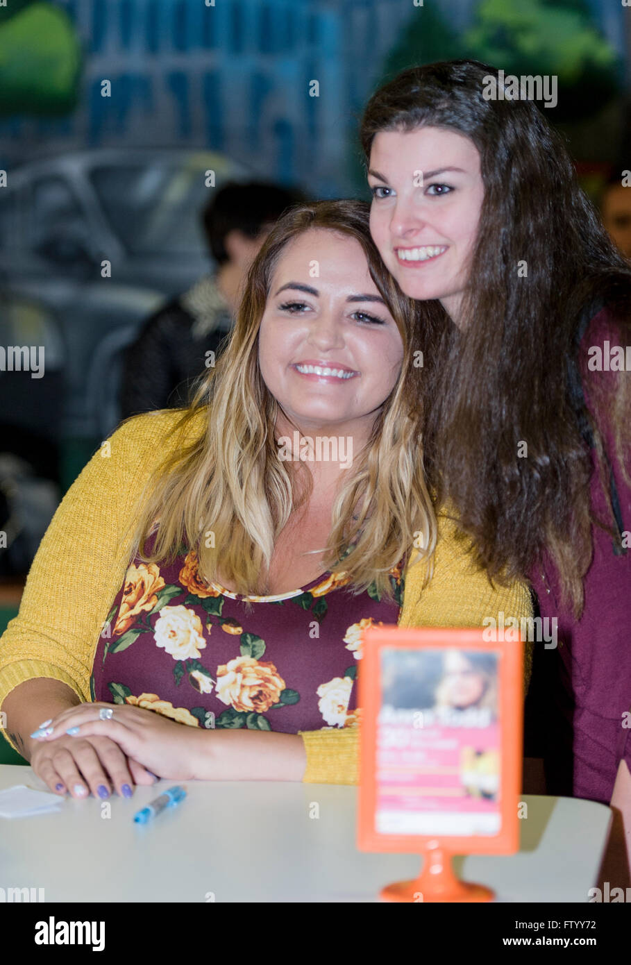 Turin, Italy. 30th Mar, 2016. Anna Todd poses for a photo with a fan ...