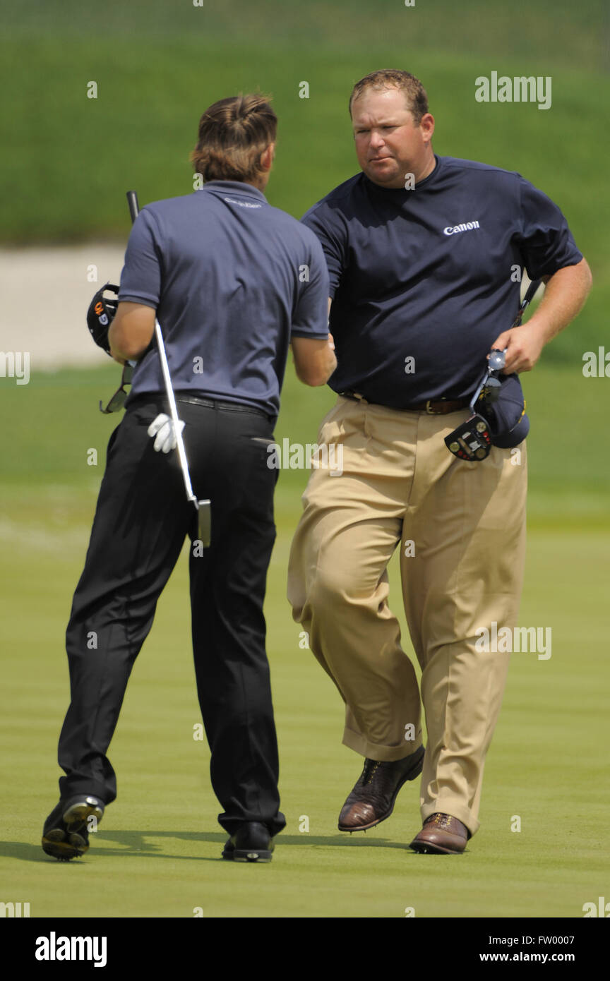 Orlando, Florida, USA. 27th Mar, 2009. Jason Gore, right, shakes hands ...