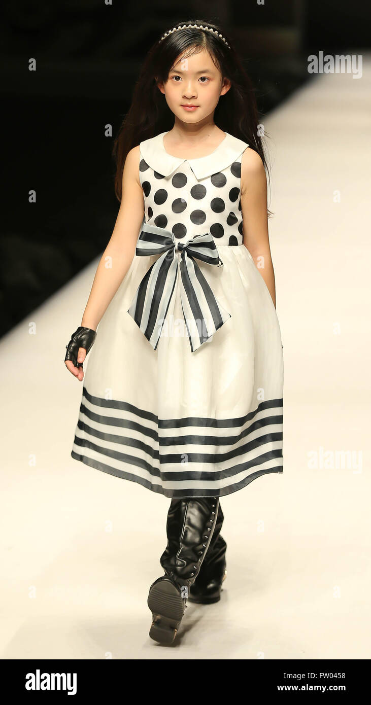 Beijing, China. 30th Mar, 2016. A model presents a creation of designer ...