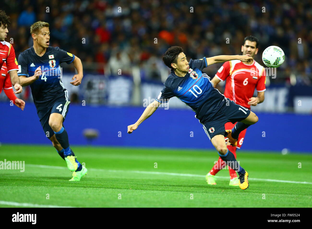 Saitama, Japan. 29th Mar, 2016. (L-R) Keisuke Honda, Shinji Kagawa (JPN ...