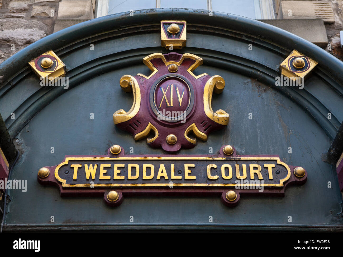 The sign above the entrance to Tweeddale Court along the Royal Mile in ...